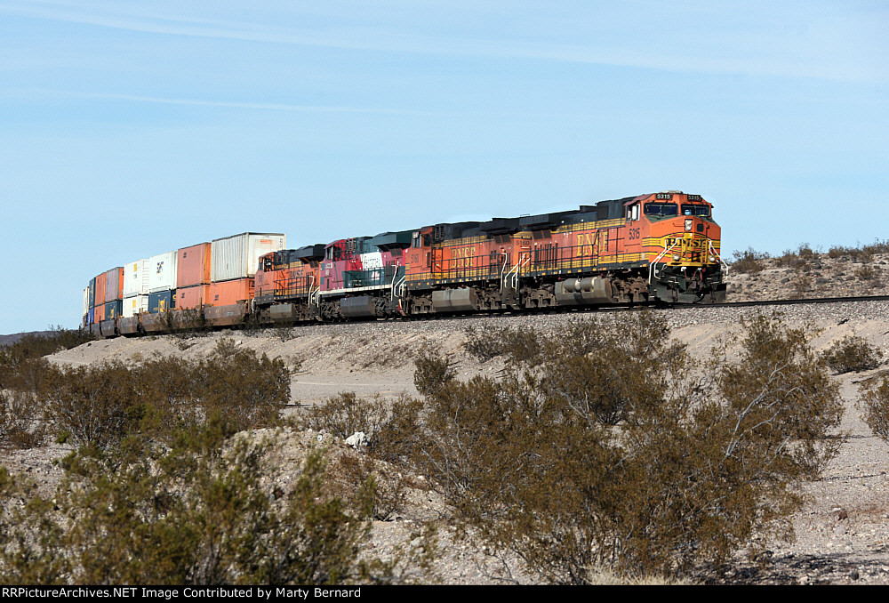 BNSF 5351, 5160, FXE 4698, and BNSF 7545